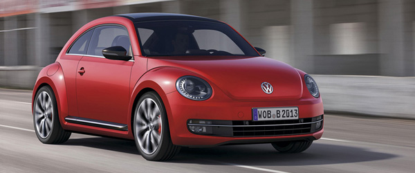 2012-Volkswagen-Beetle-in-red,-exterior-in-motion-600 : Automotive Addicts